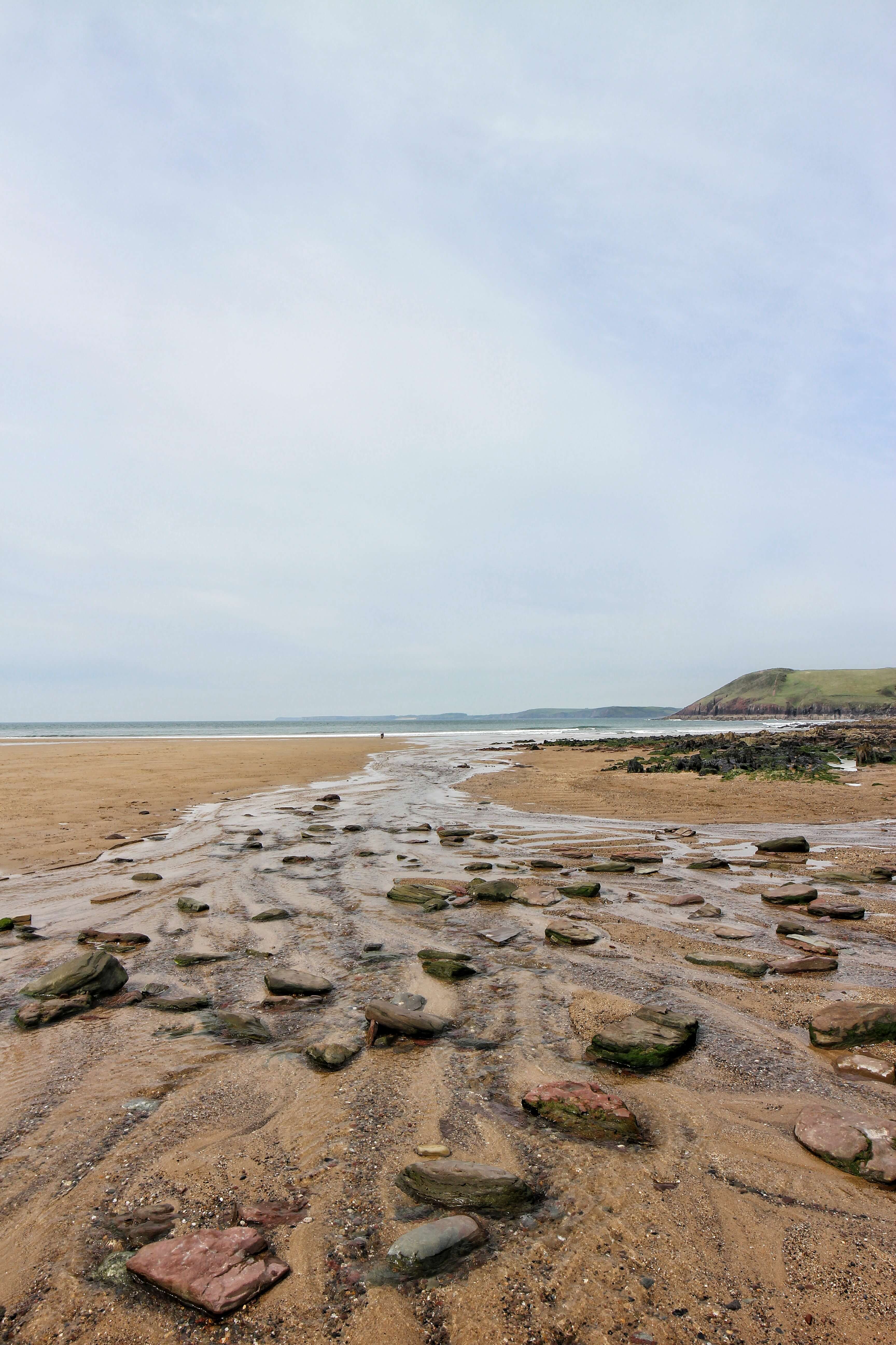 Things to do near Bluestone: Manorbier Beach and Castle | The Helpful Hiker